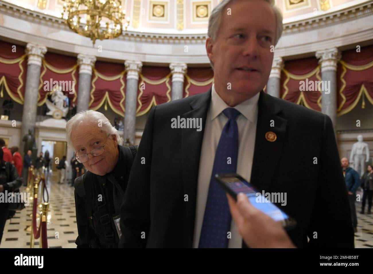 AP photographer J. Scott Applewhite looks around Rep. Mark Meadows, R-N ...