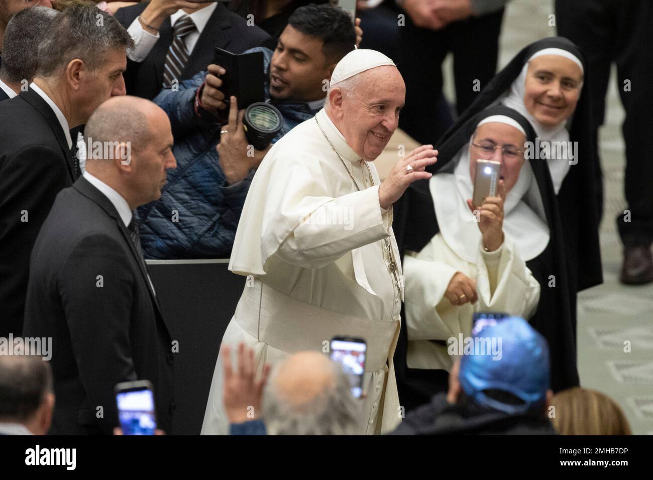 Pope Francis arrives in the Paul VI Hall at the Vatican for his weekly ...