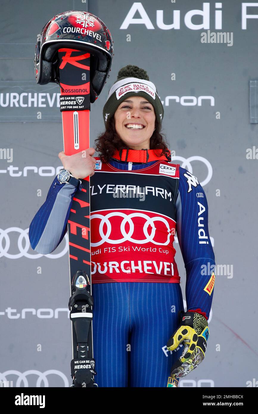 Italy's Federica Brignone celebrates on the podium after winning an ...