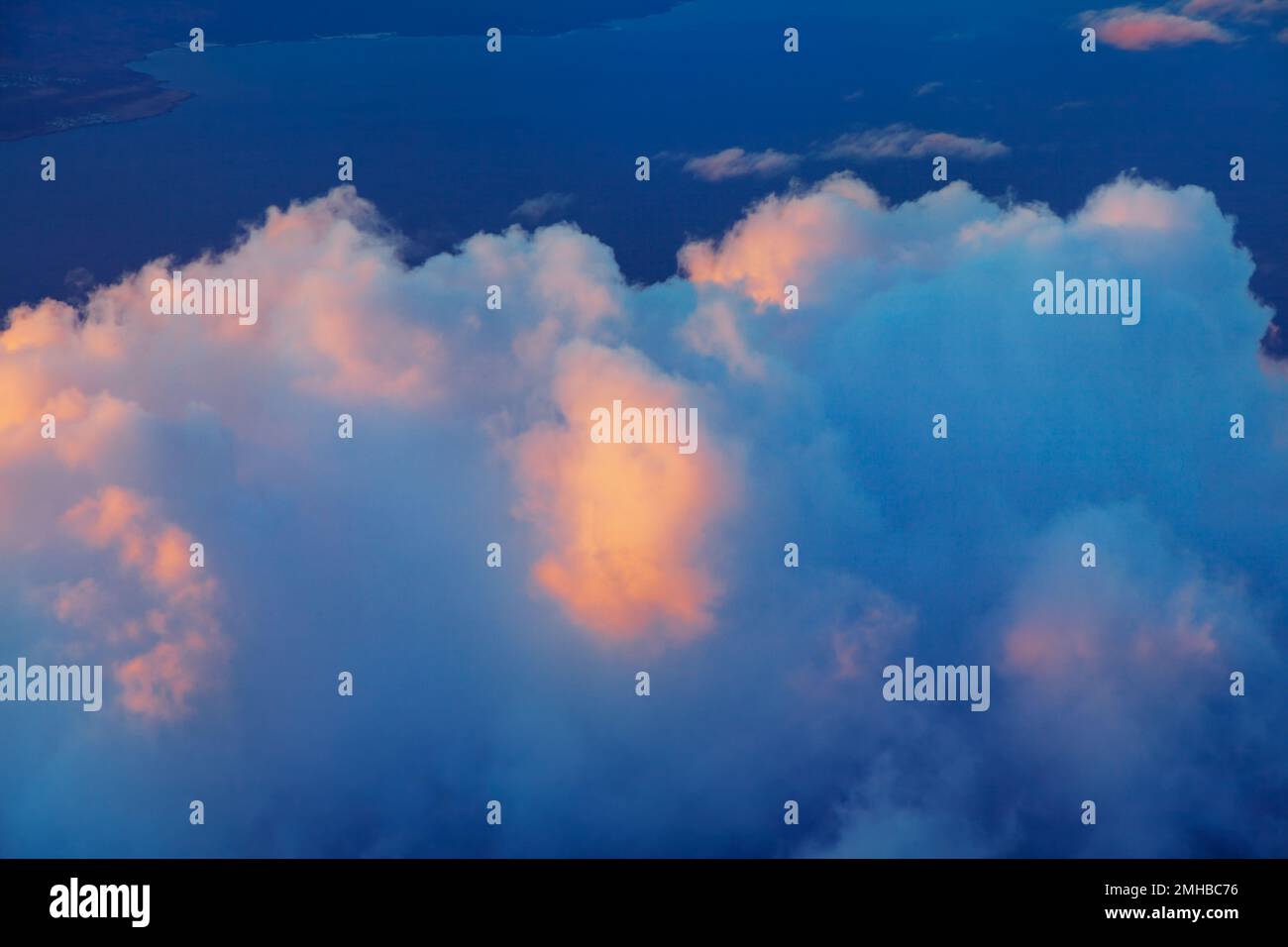 Clouds with sun beam . Clouds over the sea view from above Stock Photo ...