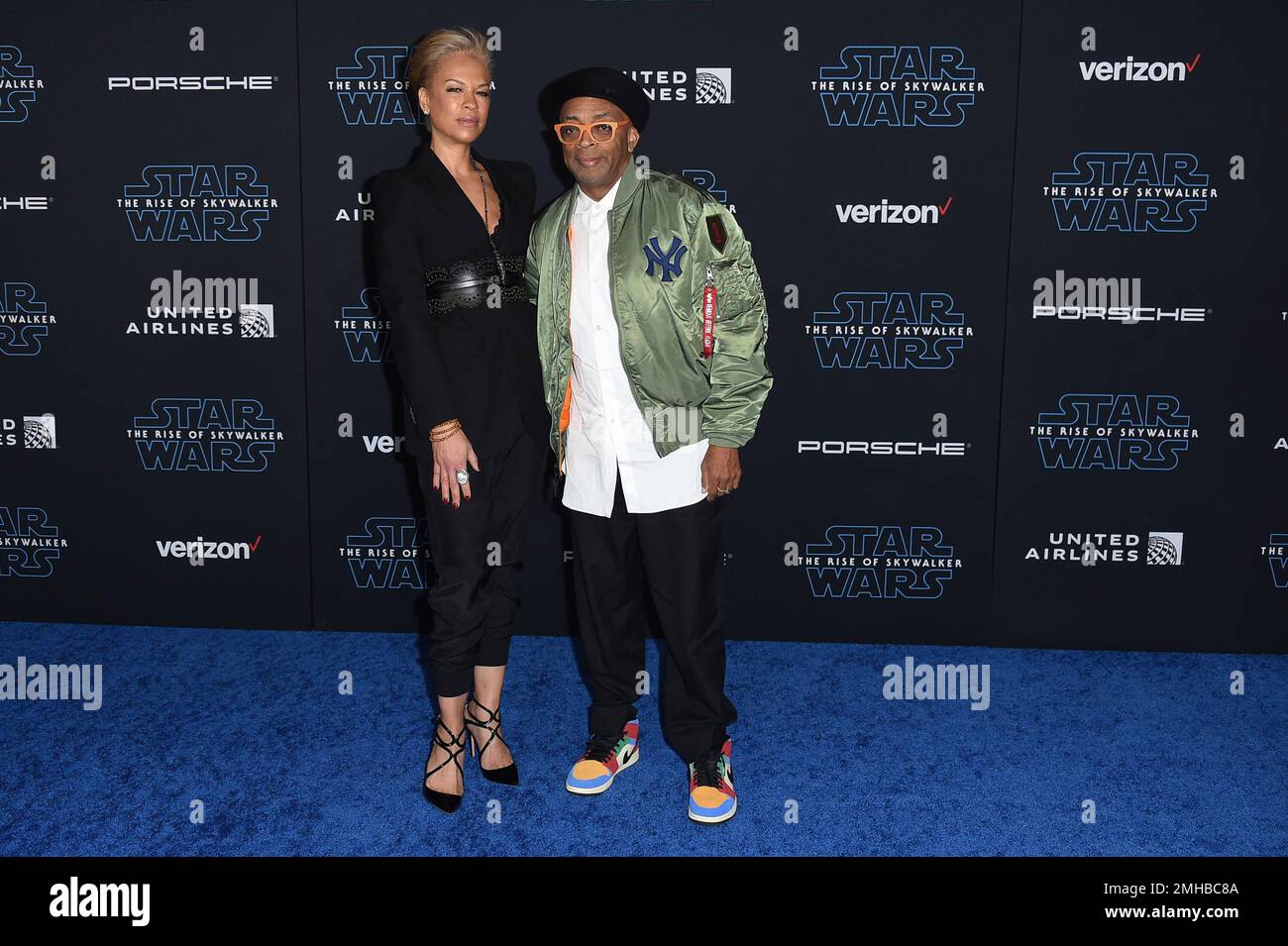Spike Lee, right, and Tonya Lewis Lee arrive at the world premiere of ...
