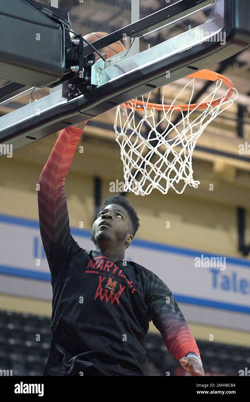 Maryland forward Makhi Mitchell warms up before an NCAA college ...