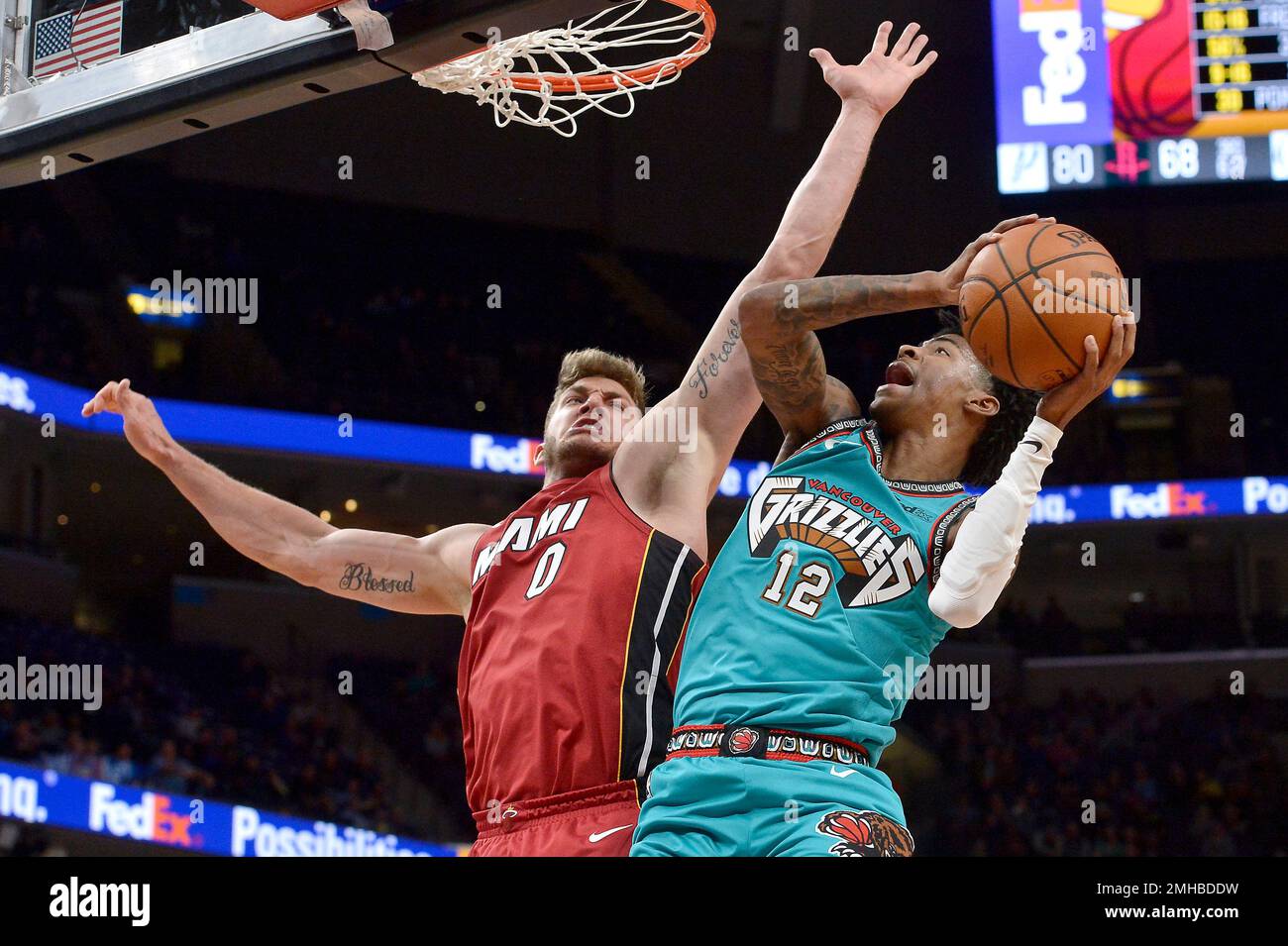 Memphis Grizzlies guard Ja Morant (12) shoots against Miami Heat ...