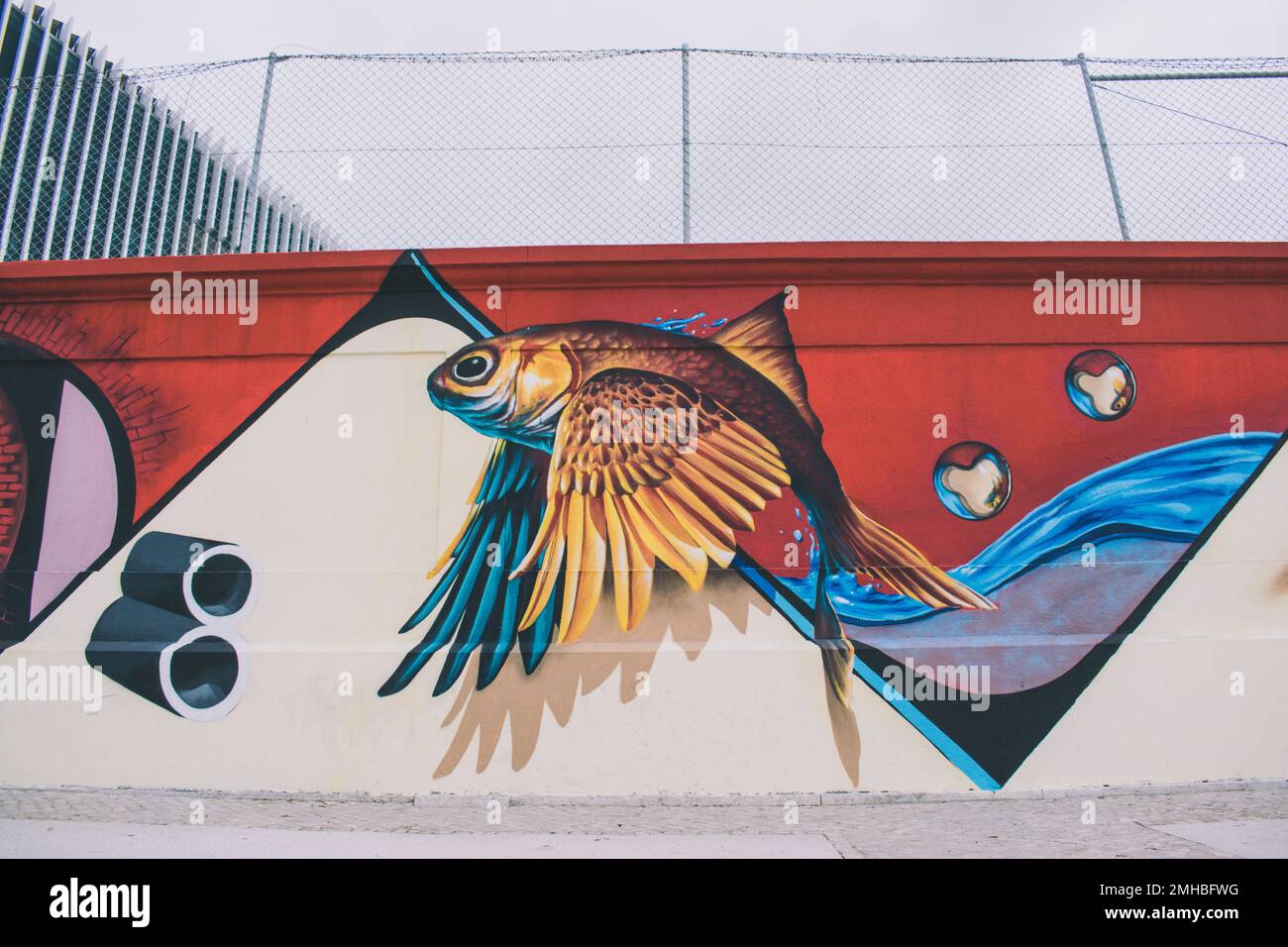 Brown Flying Fish mural Stock Photo - Alamy