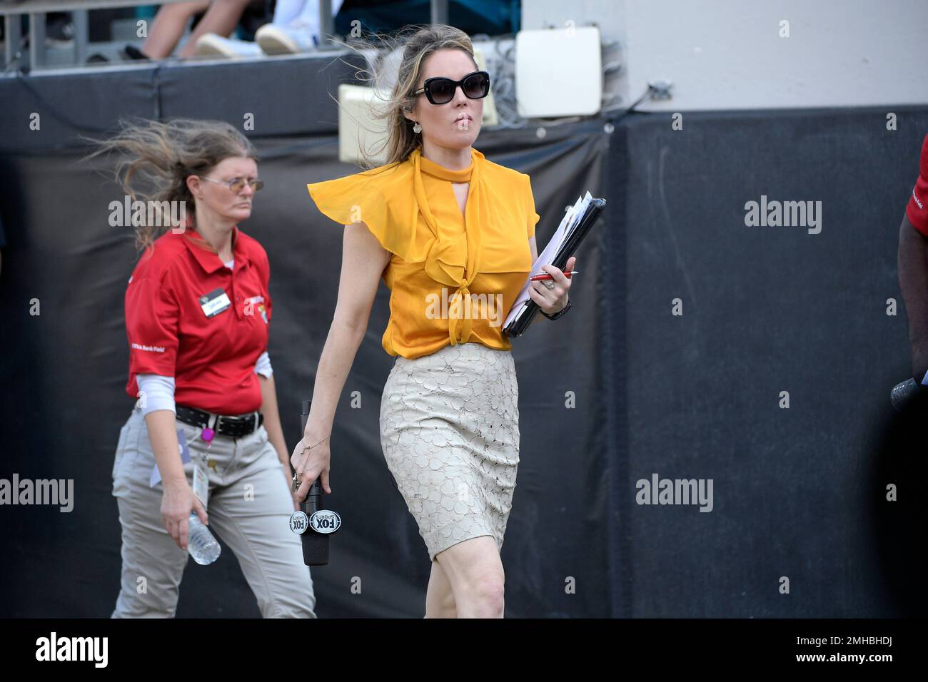 FOX Sports sideline reporter Jennifer Hale walks on the field during ...