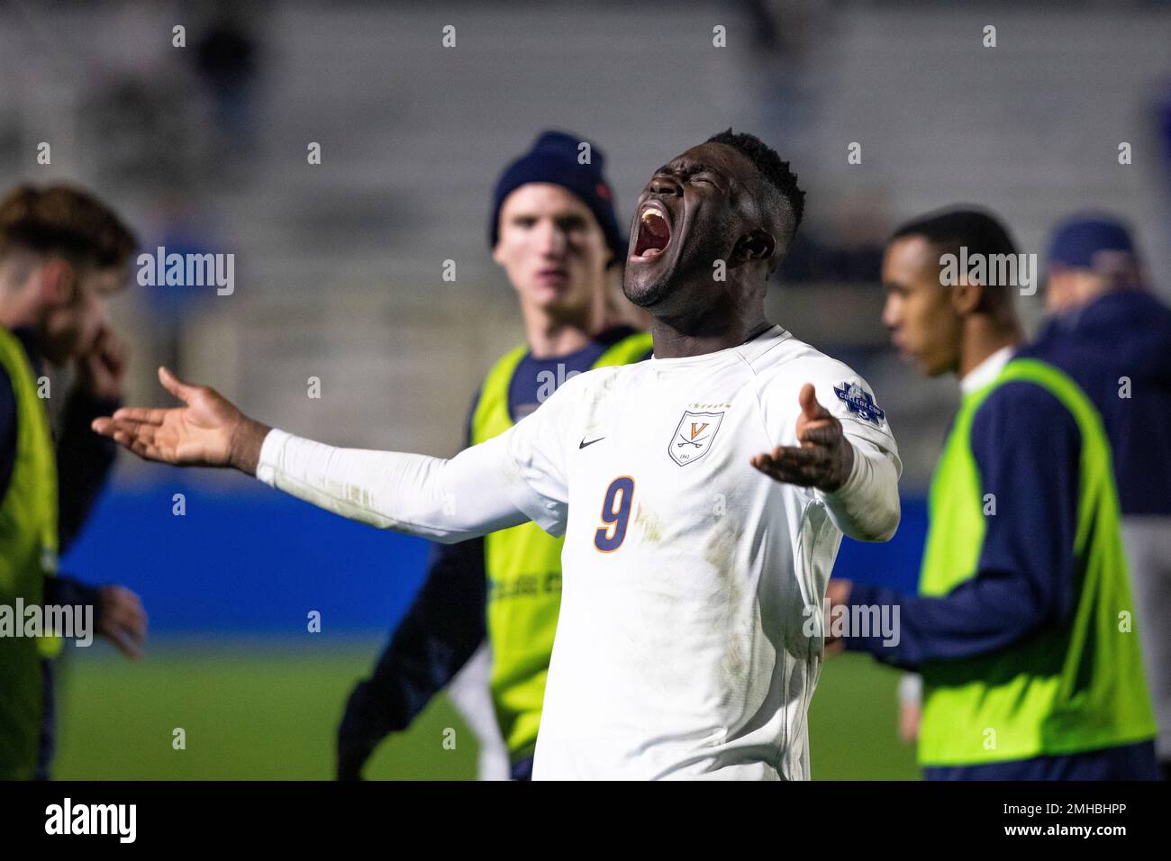 Virginia's Daryl Dike (9) shouts to the crowd during the NCAA college ...