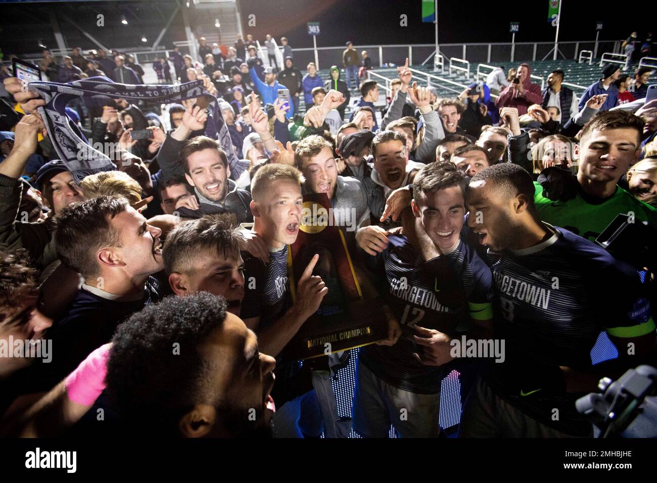 Georgetown celebrates after winning the NCAA college soccer ...