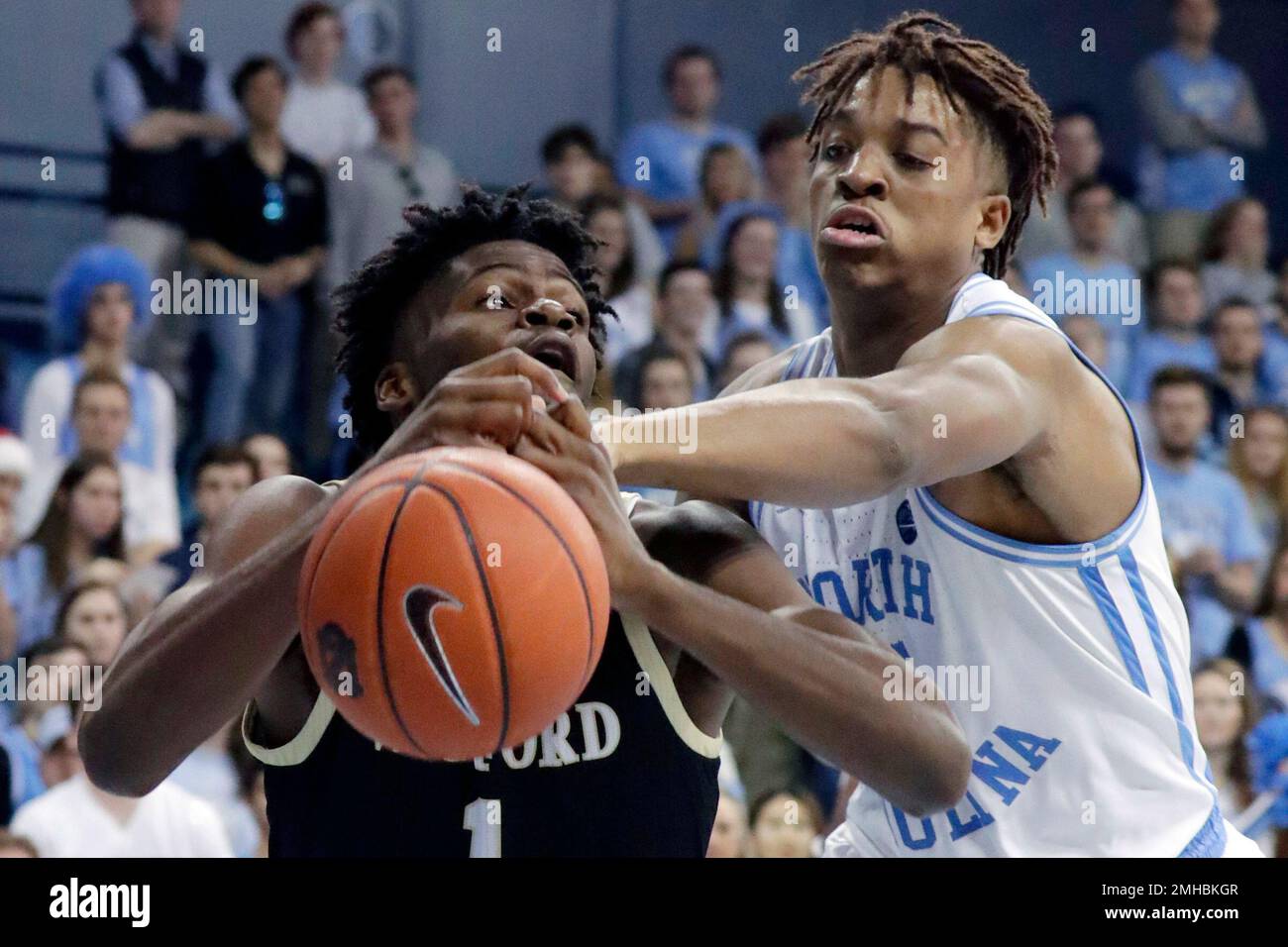 Wofford's Chevez Goodwin (1) is defended by North Carolina's Armando ...
