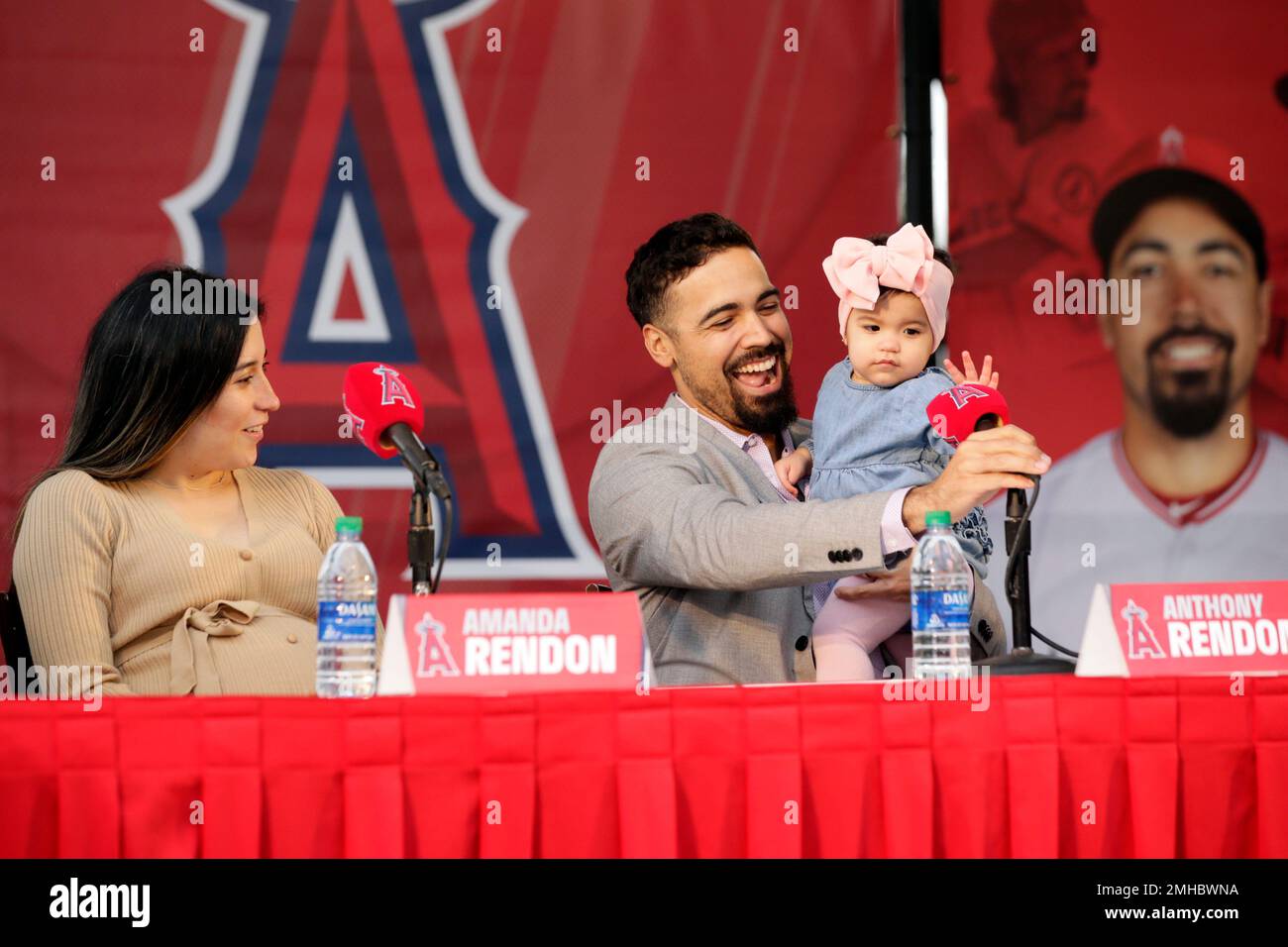 Anthony Rendon grapples with his daughter, Emma Rendon, for the ...