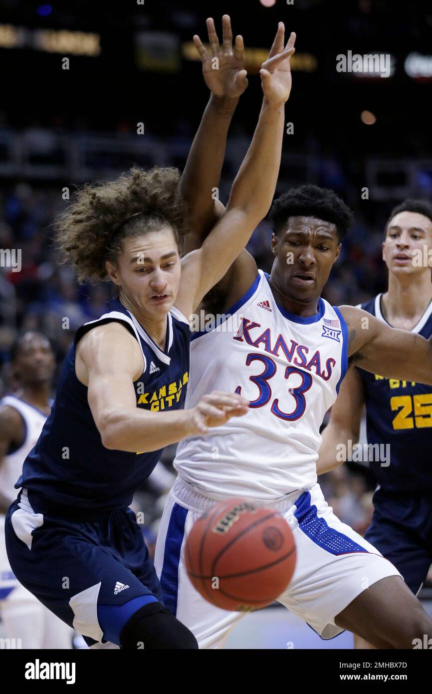 Kansas City forward Josiah Allick, left, and Kansas forward David ...