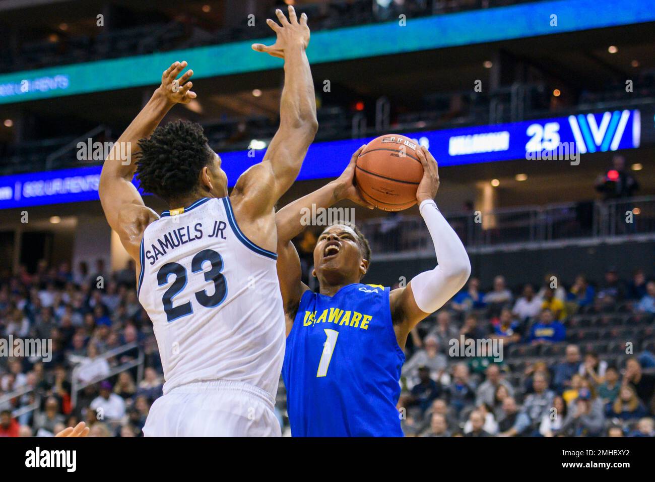Villanova forward Jermaine Samuels (23) defends as Delaware guard Kevin ...
