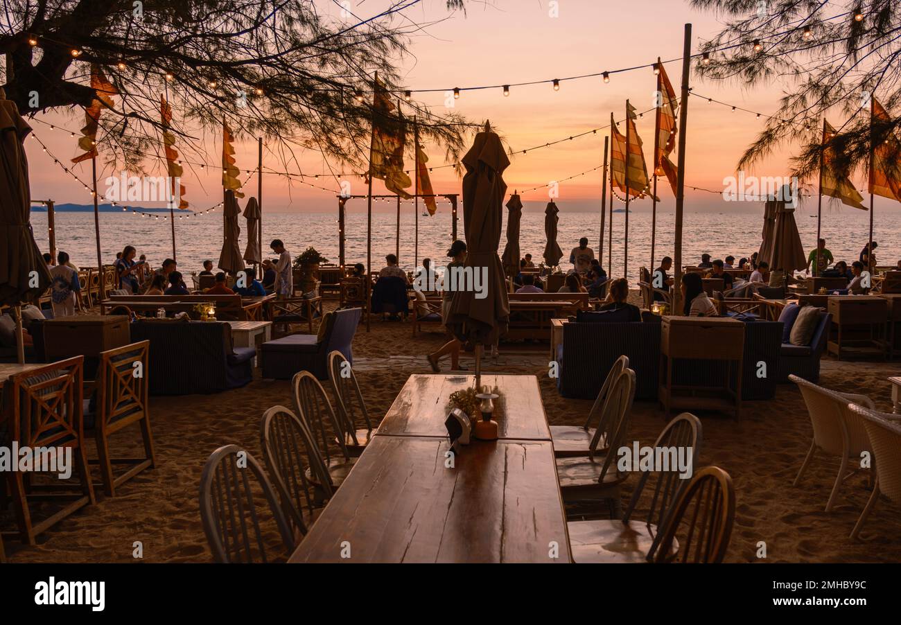 Pattaya Thailand January 2022, people dining on the beach during sunset ...
