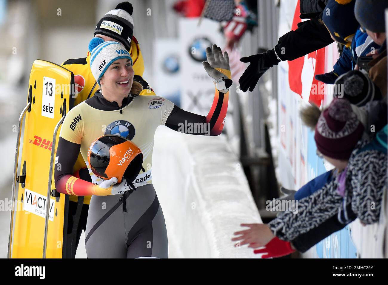 Jacqueline Loelling, of Germany, greets fans after her second place ...