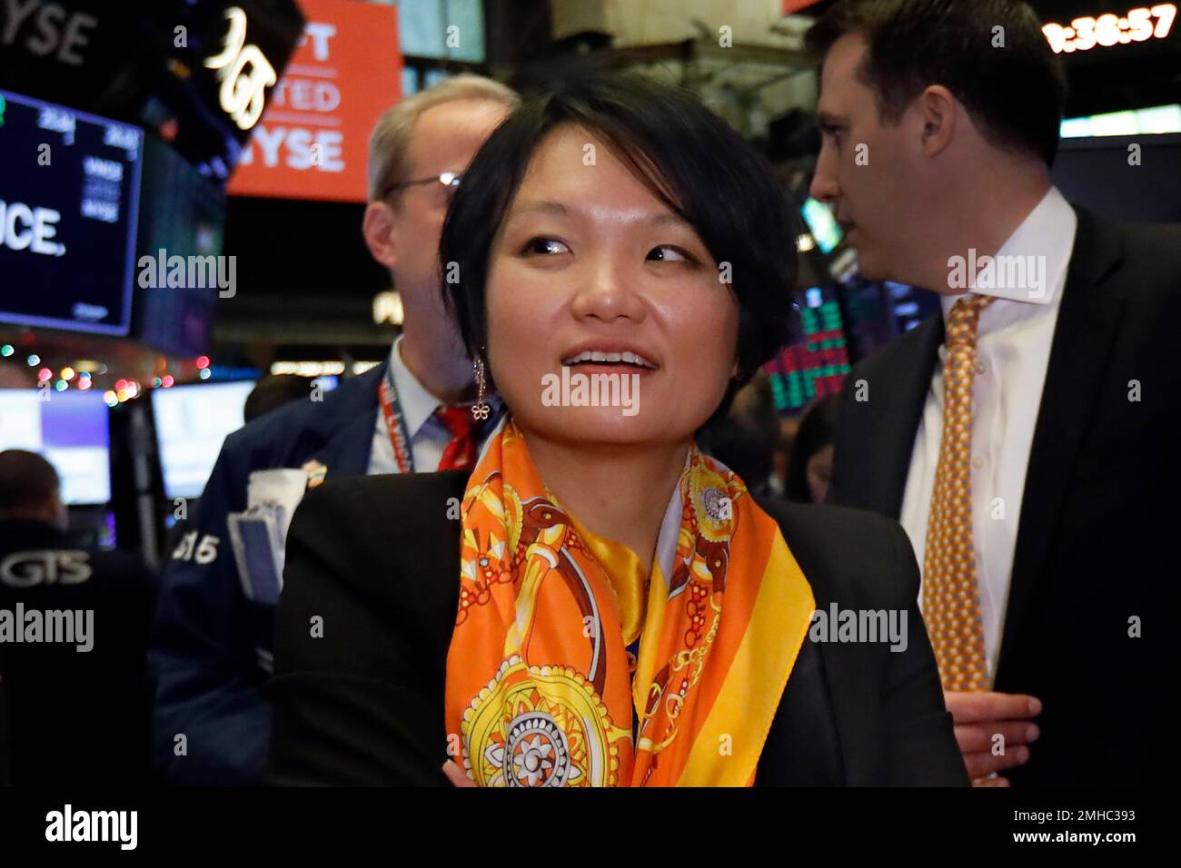 OneConnect Director Jessica Tan is photographed on the floor of the New ...