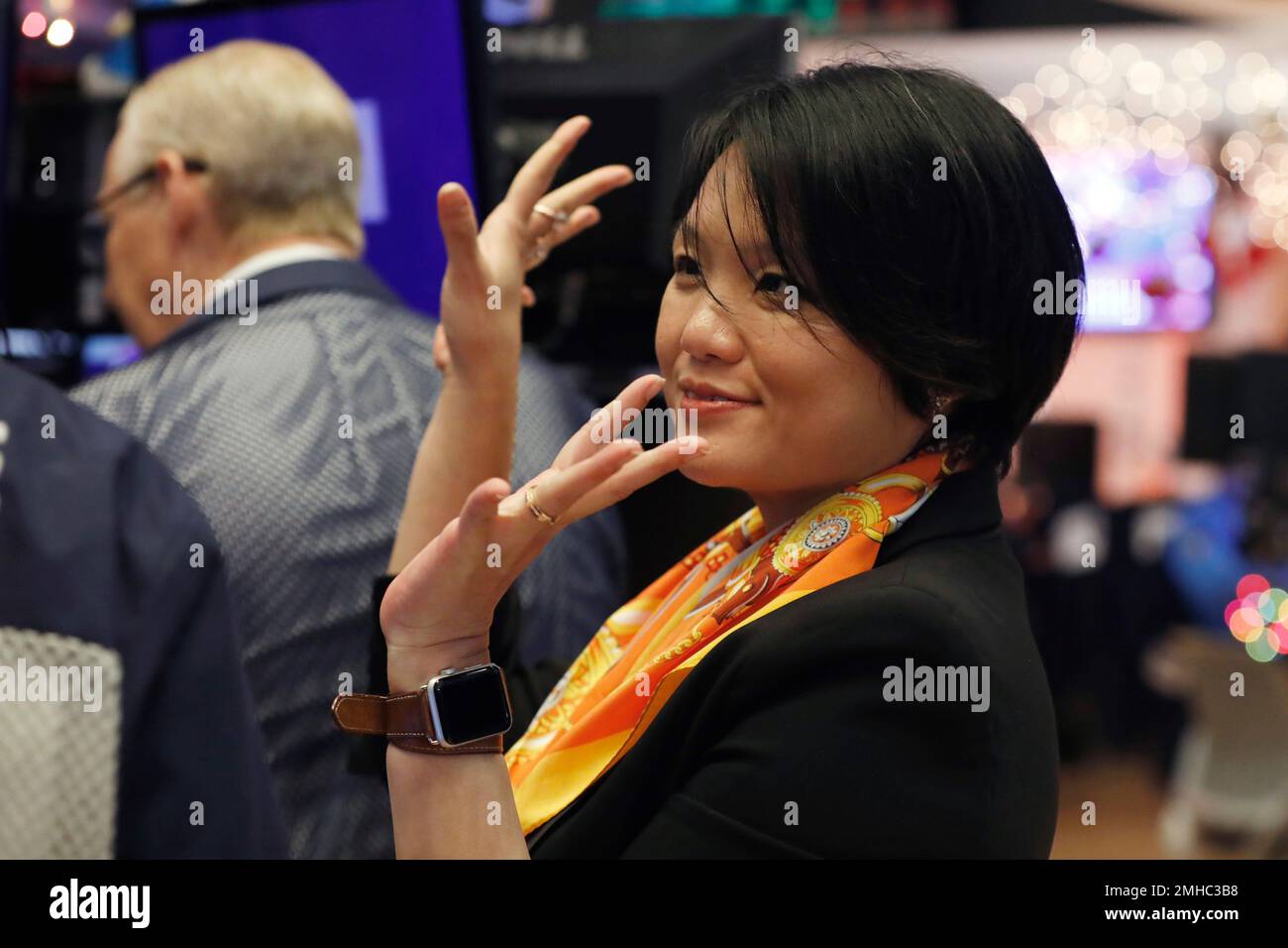 OneConnect Director Jessica Tan is photographed on the floor of the New ...