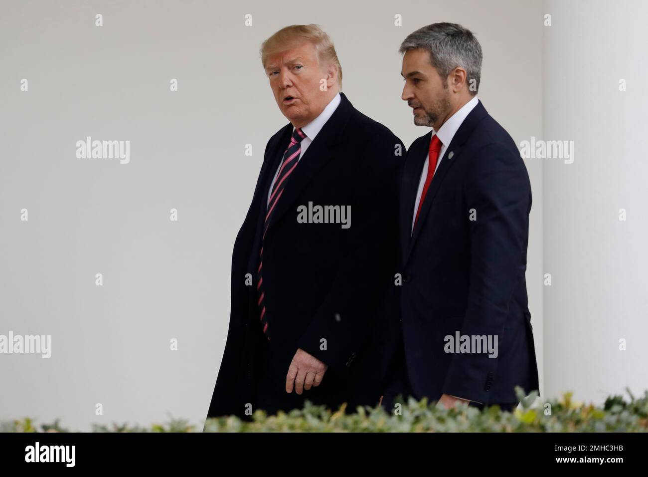 President Donald Trump walks with Paraguay's President Mario Abdo ...