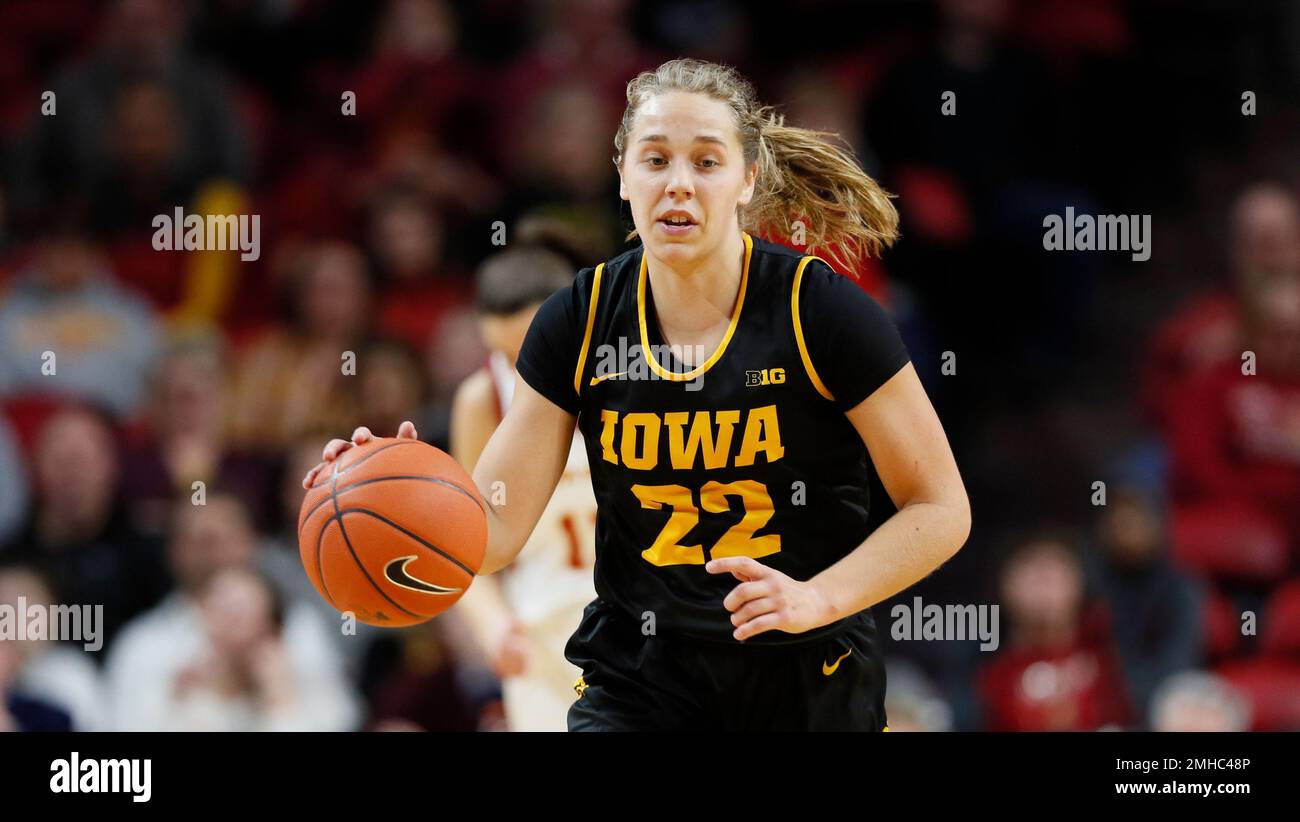 Iowa guard Kathleen Doyle drives up court during an NCAA college ...
