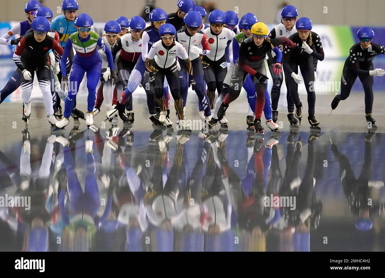 Skaters compete in the ladies mass start race of the speed skating ...