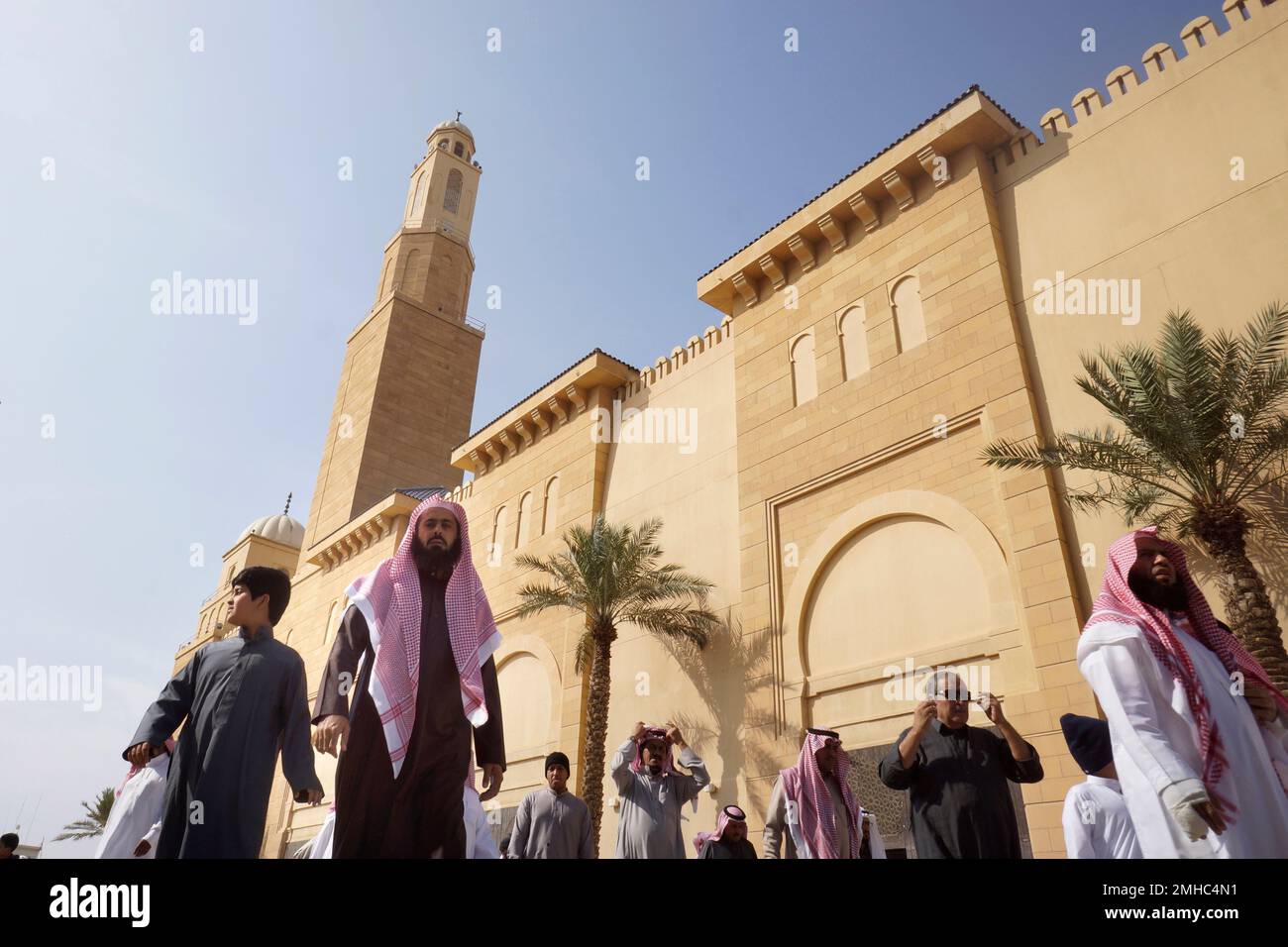 Saudis leave Friday prayers at Al Rajhi Mosque in Riyadh, Saudi Arabia, Friday, Dec. 13, 2019 ...