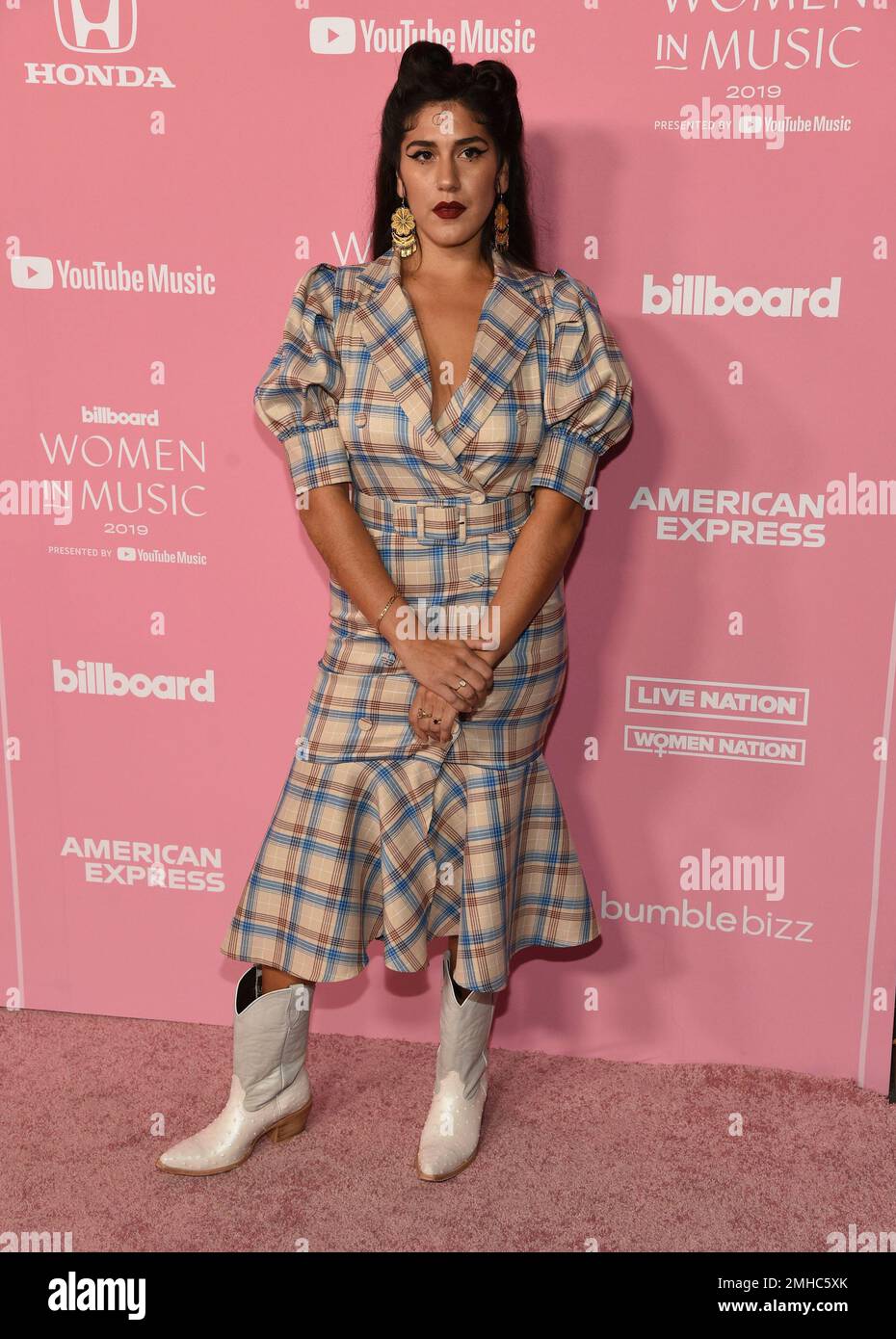 La Doña arrives at Billboard's Women in Music at the Hollywood ...