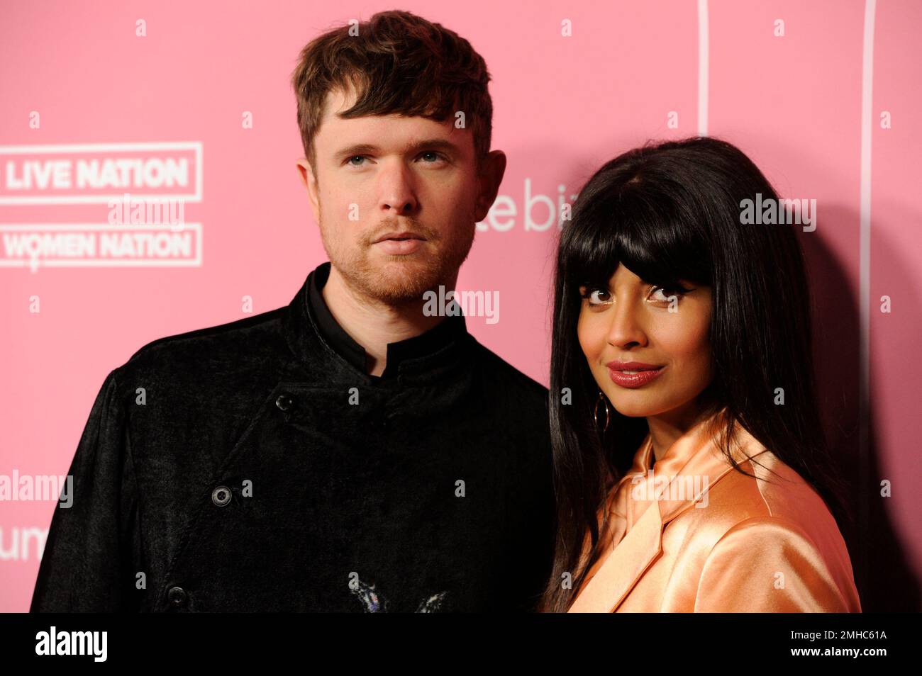 James Blake, left, and Jameela Jamil arrive at Billboard's Women in ...