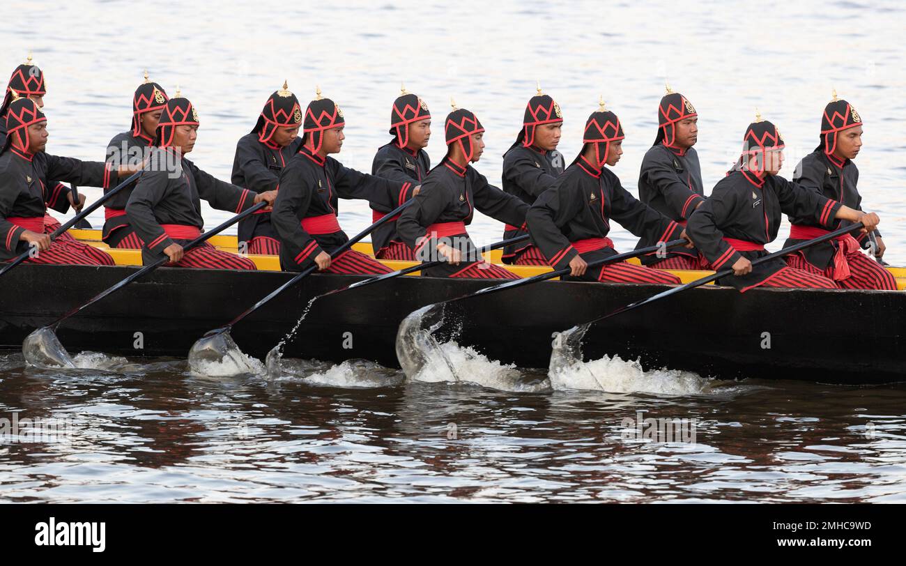 Oarsmen paddle one of the royal barges during the Royal Barge ...
