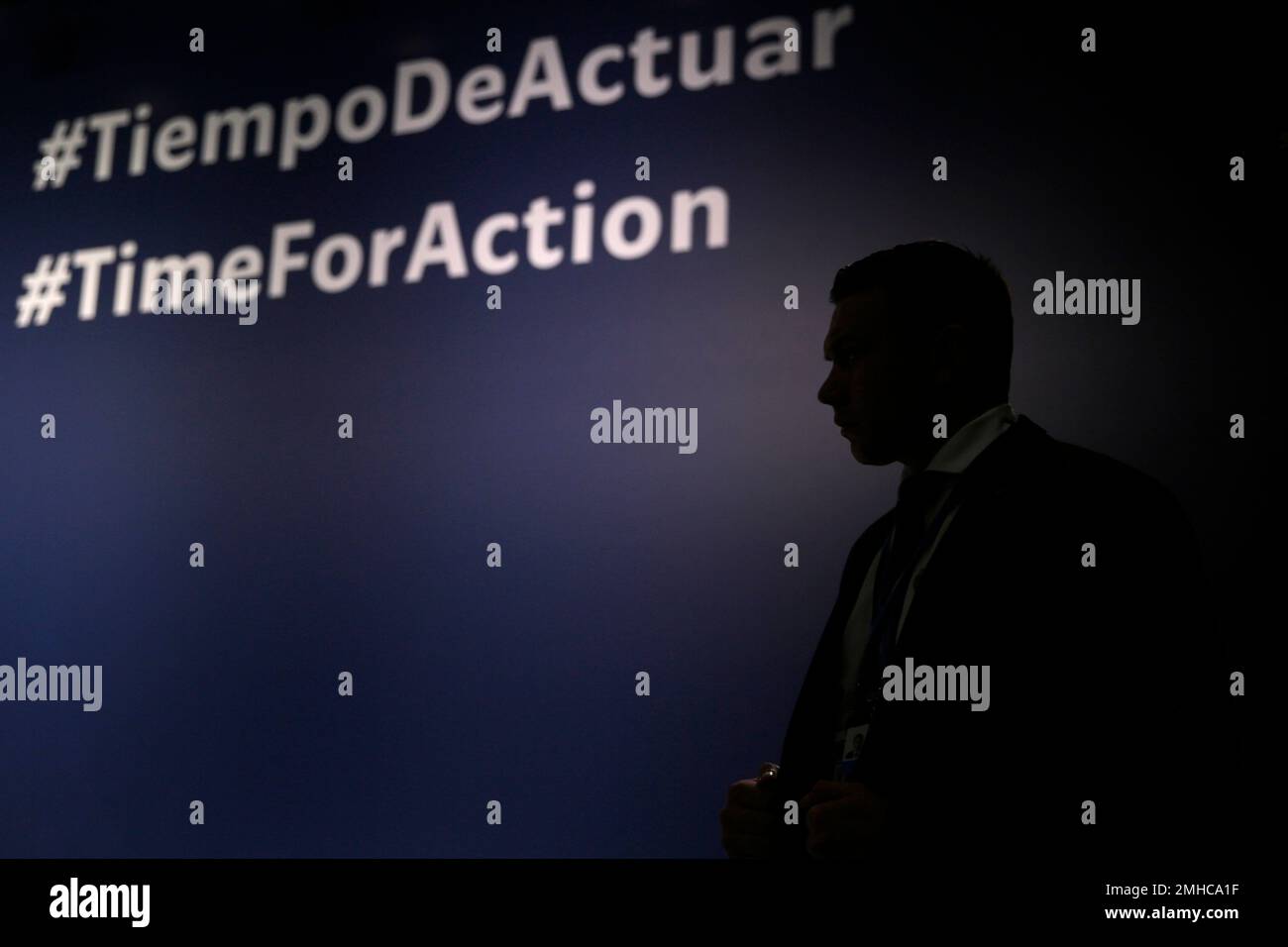 A visitor attends the COP25 climate talks summit in Madrid, Spain ...