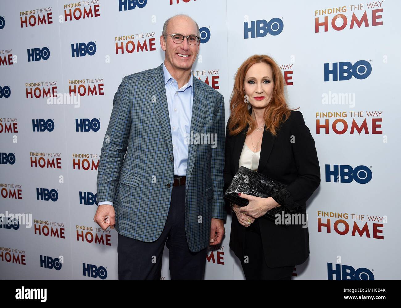 WarnerMedia CEO John Stankey, left, and author J.K. Rowling attend the ...