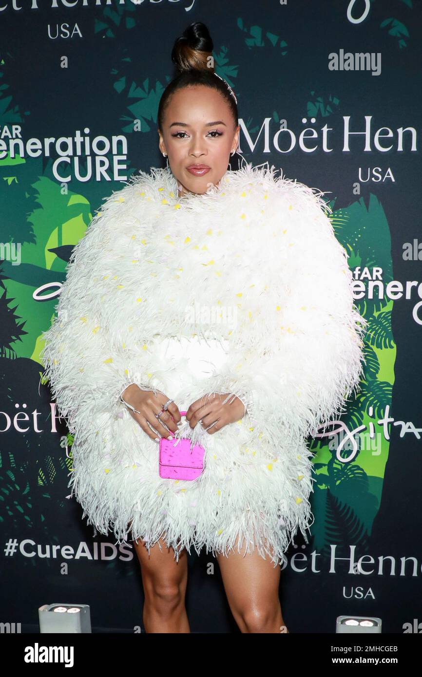 Serayah attends the amfAR GenerationCURE's 5th annual holiday party ...