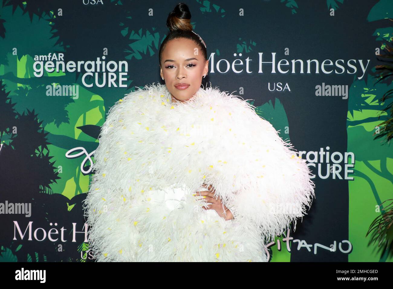 Serayah attends the amfAR GenerationCURE's 5th annual holiday party ...