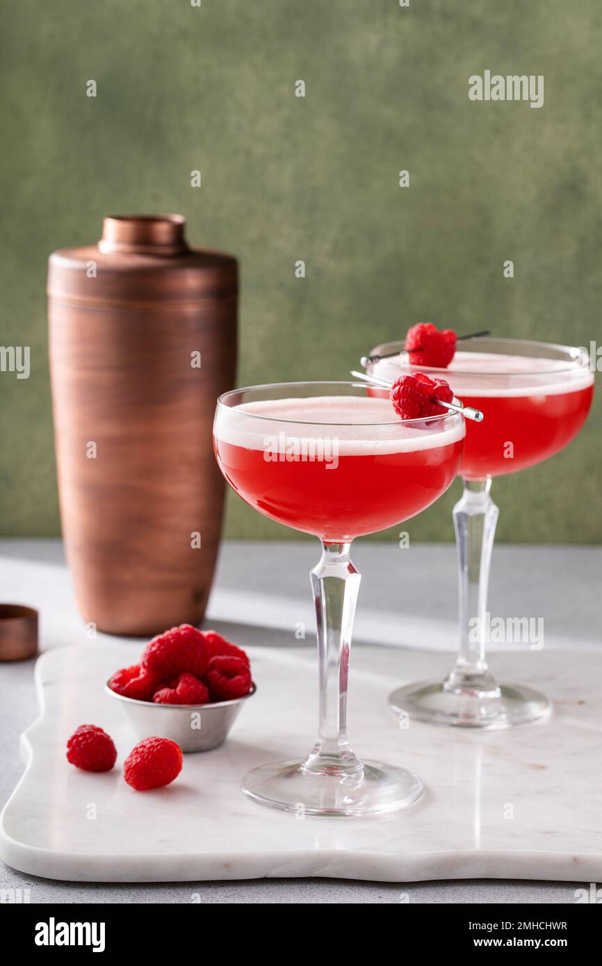 Raspberry martini cocktail with vodka, juice and raspberry liqueur ...