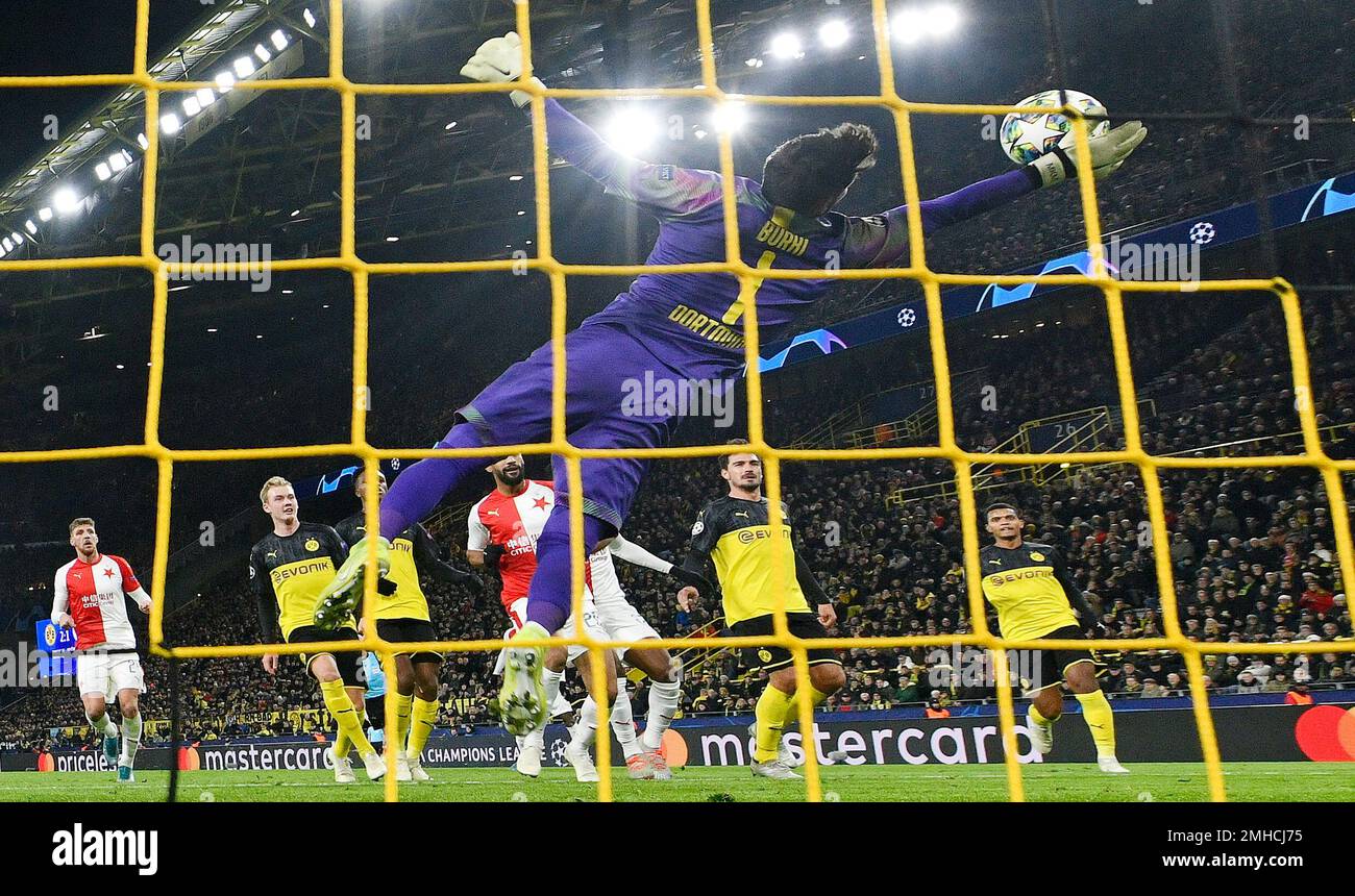 Dortmund's goalkeeper Roman Buerki saves the ball during the Champions ...