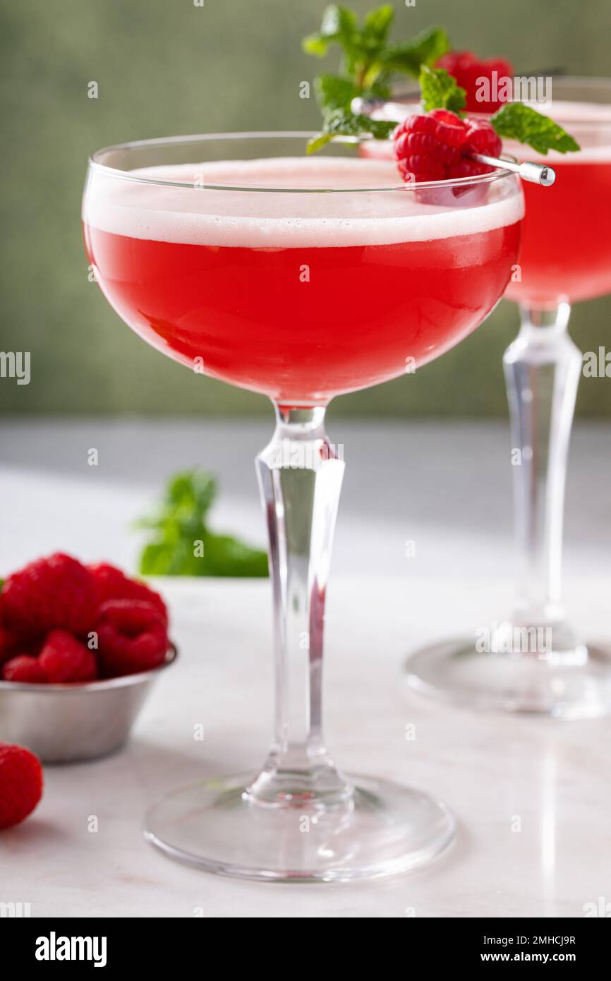 Raspberry martini cocktail with vodka, juice and raspberry liqueur ...