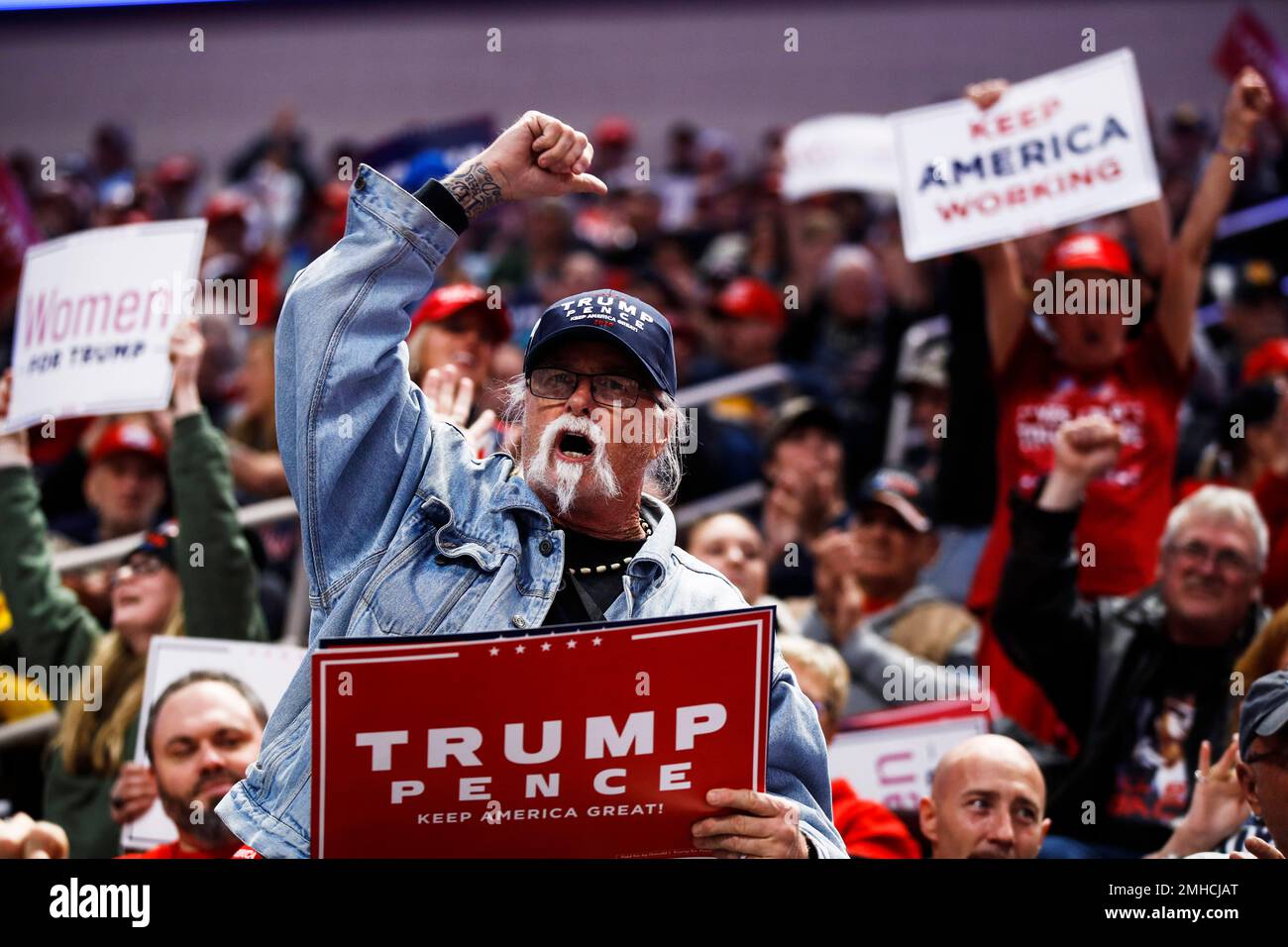 Attendees cheer ahead of a President Donald Trump campaign rally in ...