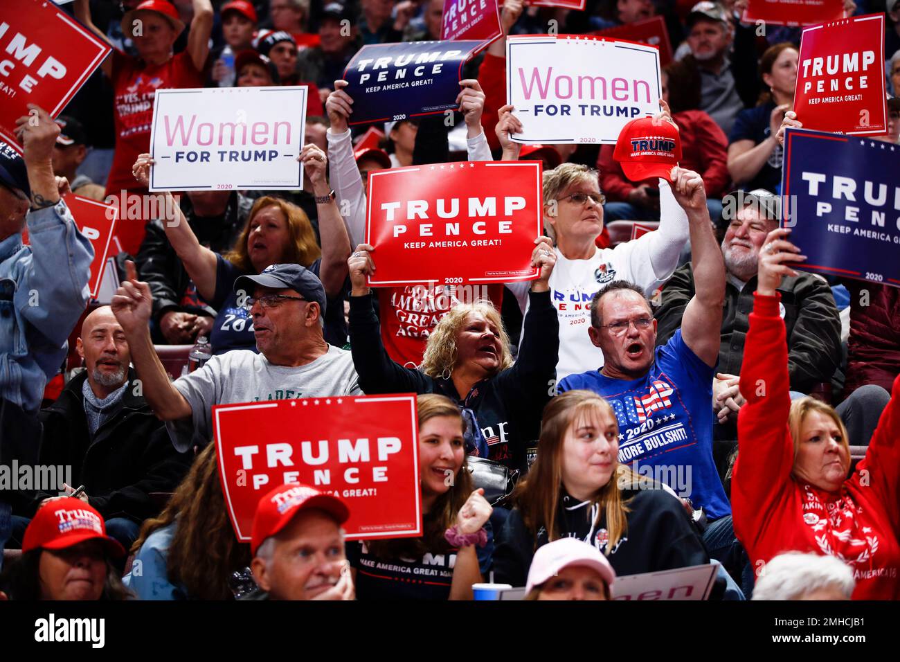 Attendees cheer ahead of a President Donald Trump campaign rally in ...