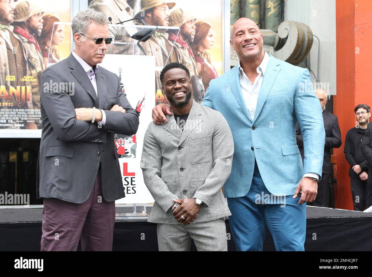 Will Ferrell, from left, Kevin Hart and Dwayne Johnson appear during a ...
