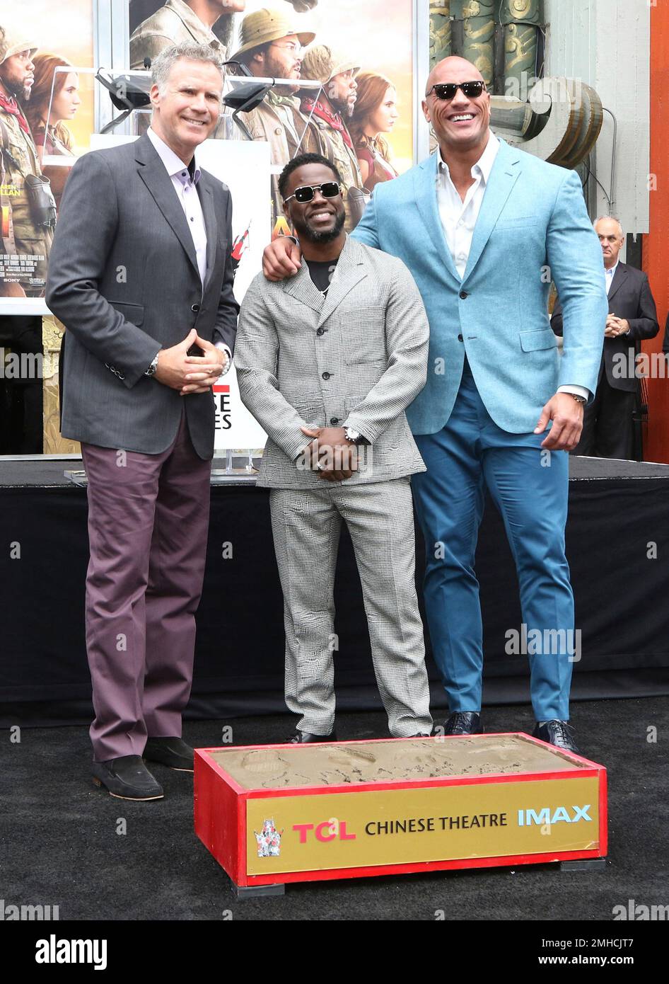 Will Ferrell, from left, Kevin Hart and Dwayne Johnson appear during a ...