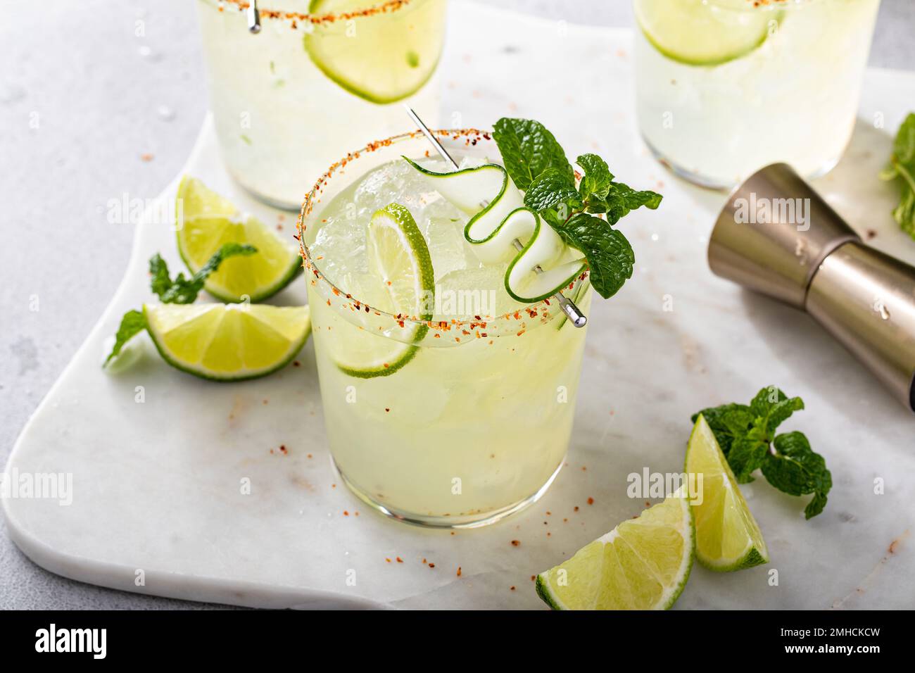 Cucumber margarita with lime and spicy rim Stock Photo - Alamy