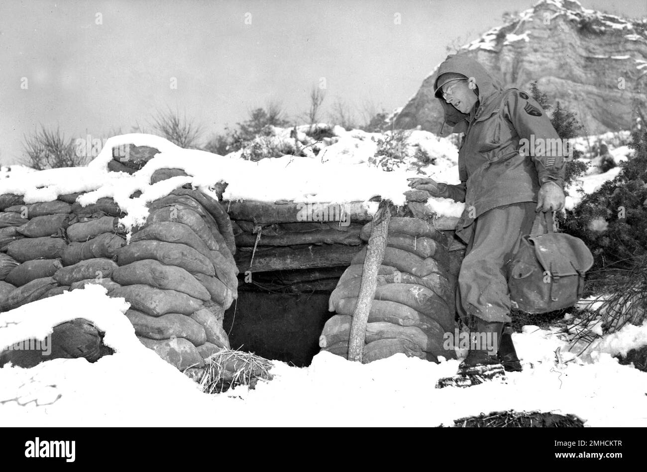 Sgt. William H. King of Chicago, Ill., enters his snow-covered ...