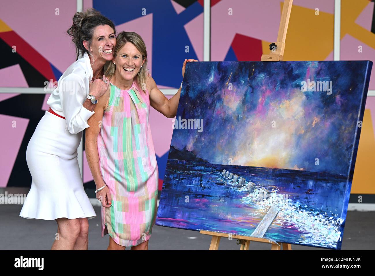 Artist Tracie Eaton (left) and Katie Kelly (right) pose for a ...