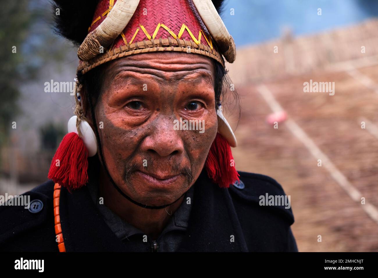 A tattooed Naga man attends the Hornbill festival at Kisama village in ...