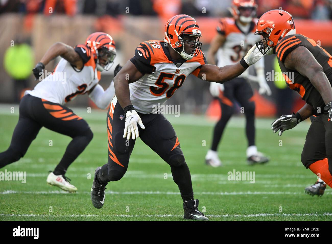 Cincinnati Bengals defensive end Carl Lawson (58) rushes the passer during an NFL football game ...