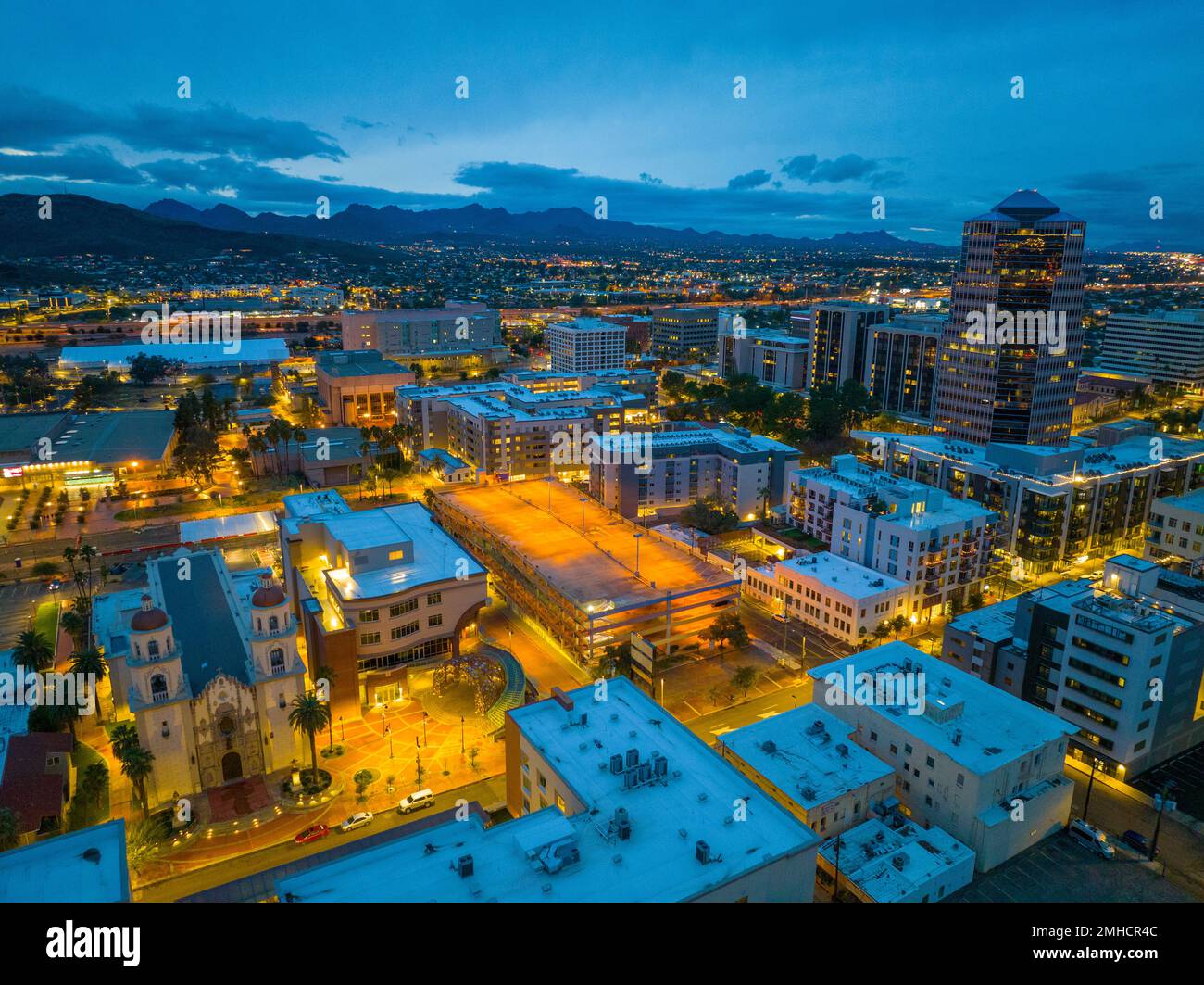St. Augustine Cathedral and Tucson skyscrapers at sunset including One ...