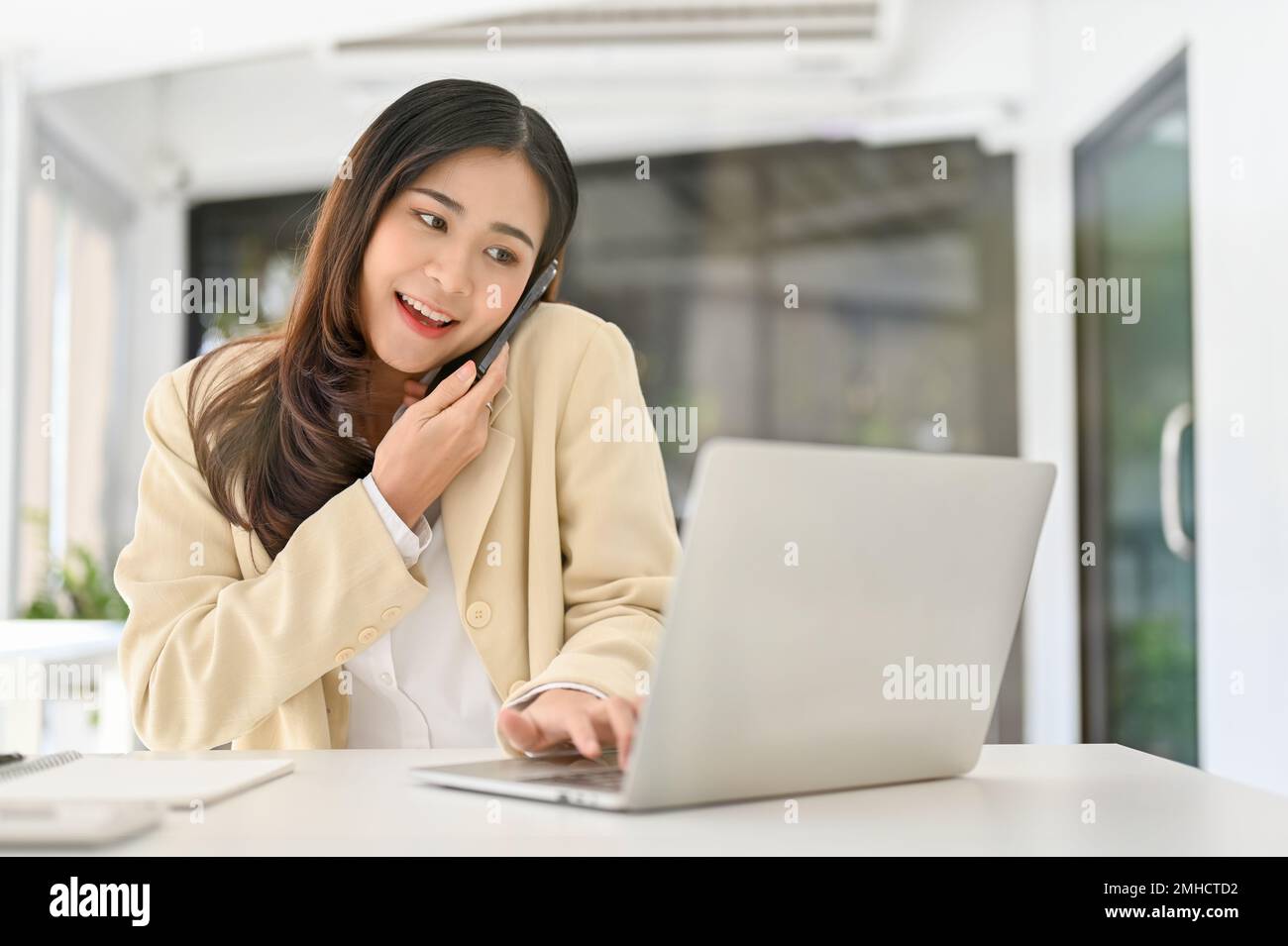 Attractive and professional young Asian businesswoman or female ...