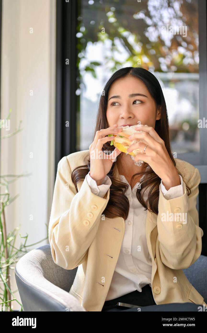 Portrait, Beautiful millennial Asian businesswoman or female office ...