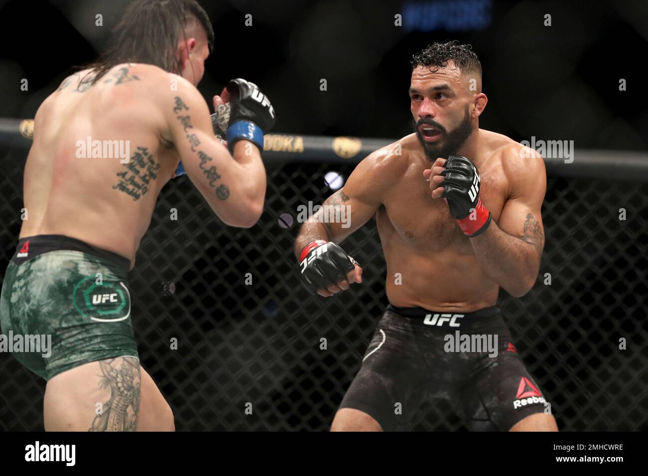 Rob Font, right, in action against Ricky Simon during their mixed ...