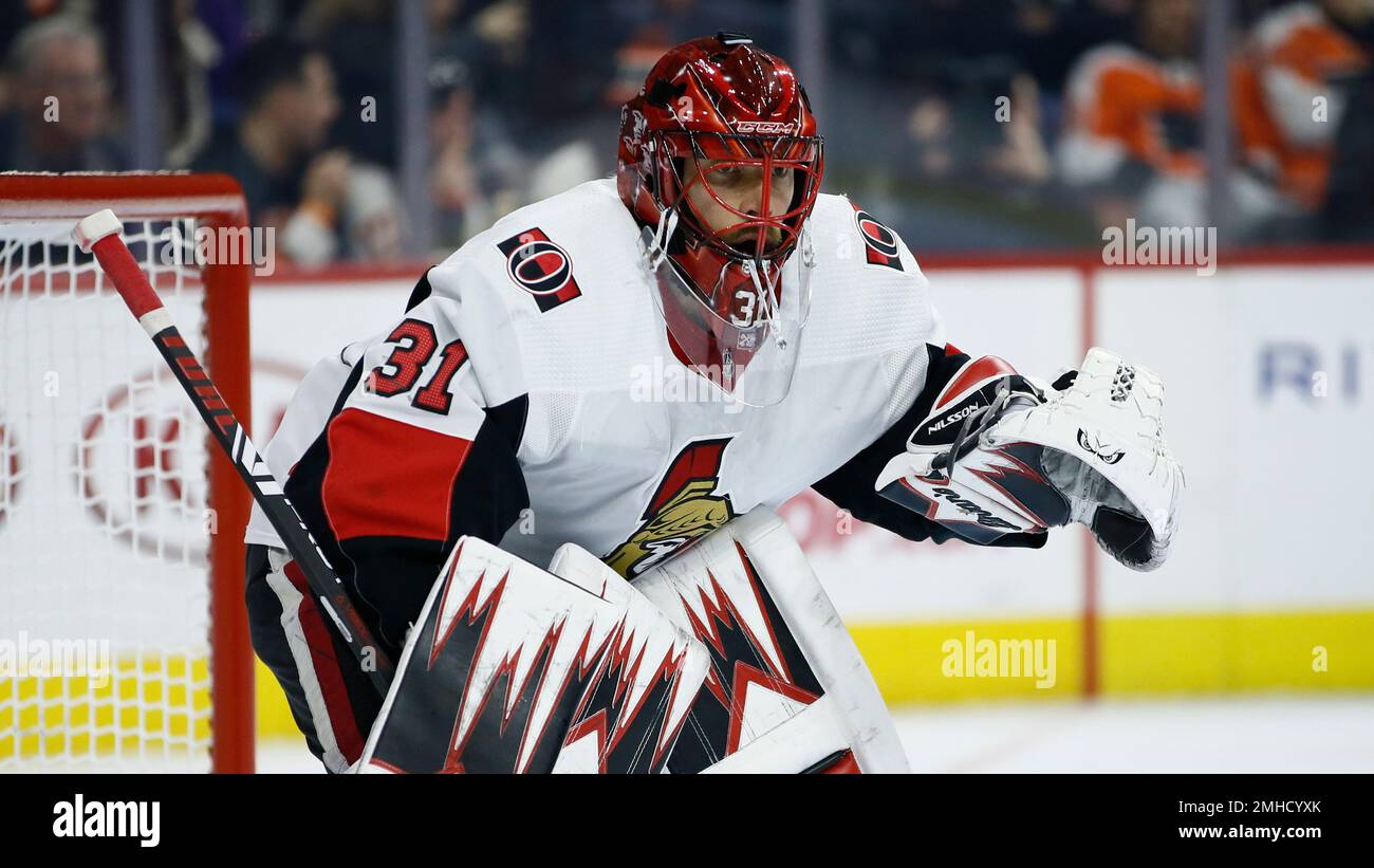Ottawa Senators' Anders Nilsson plays during an NHL hockey game against ...