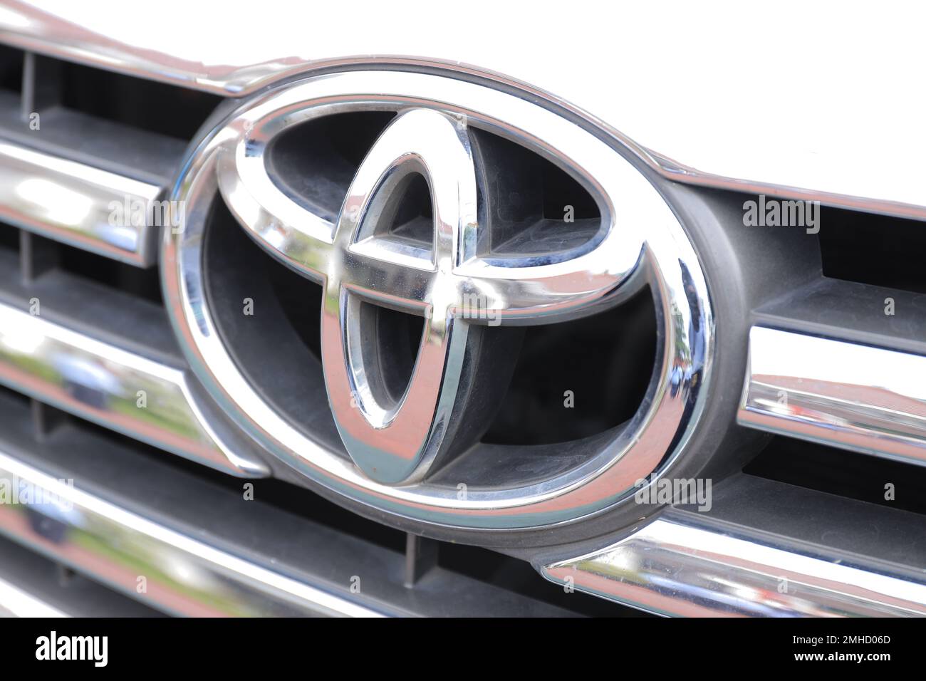 Toyota logo close up. Toyota car in the showroom Stock Photo - Alamy