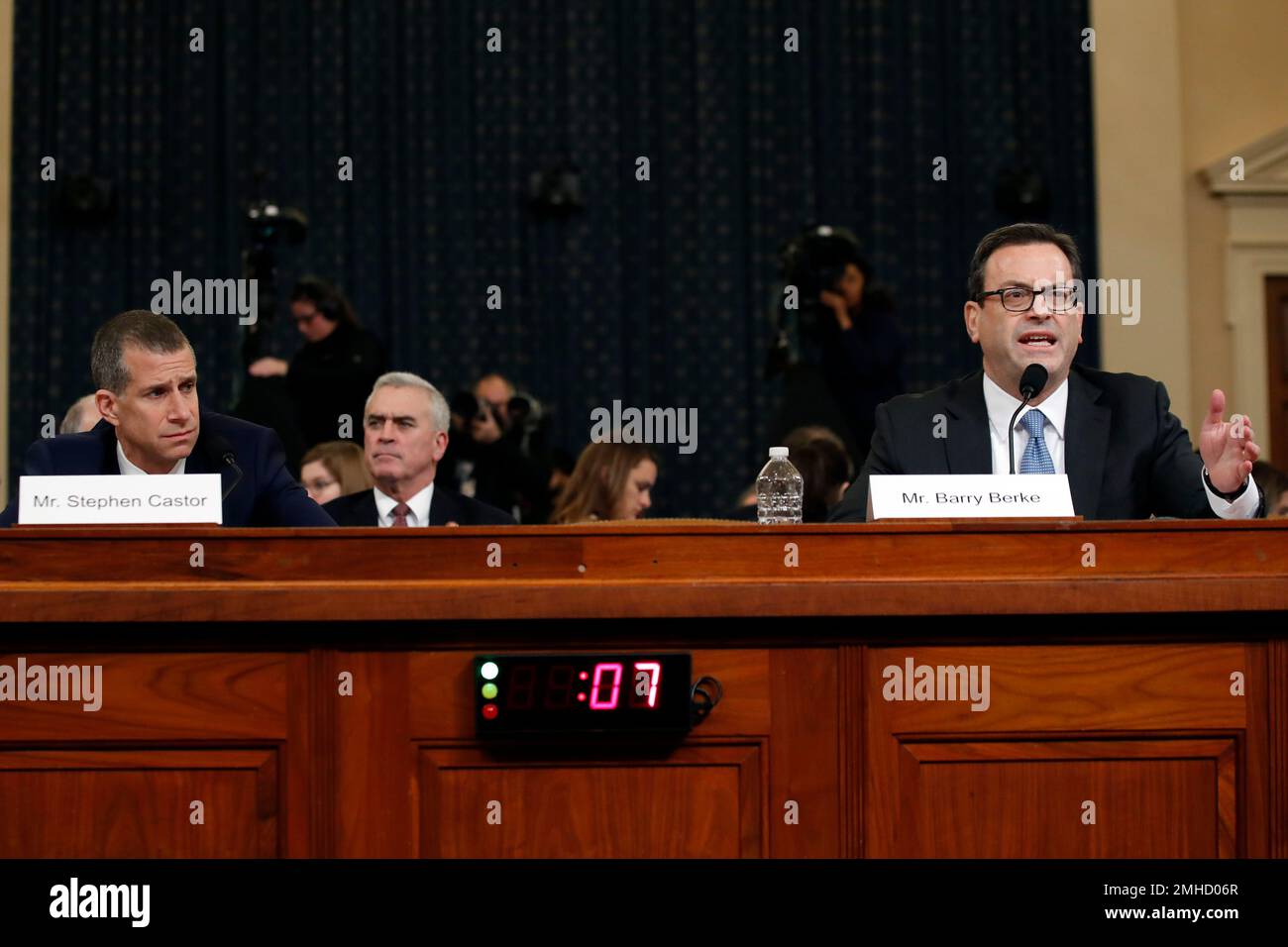 Republican staff attorney Steve Castor, left, listens as Democratic ...