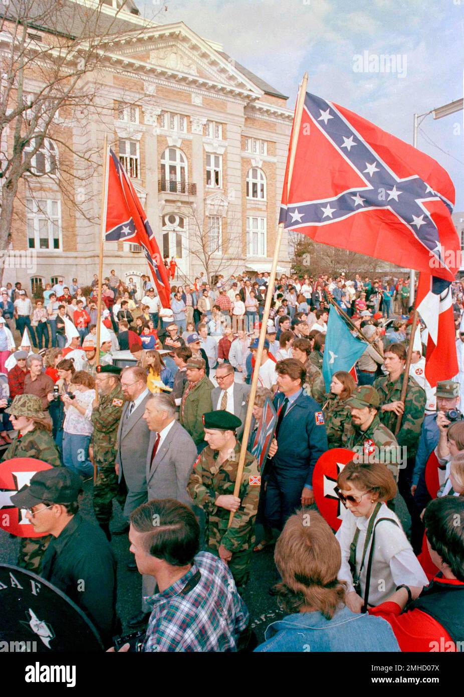 Members of the Ku Klux Klan march past the Giles County courthouse in ...